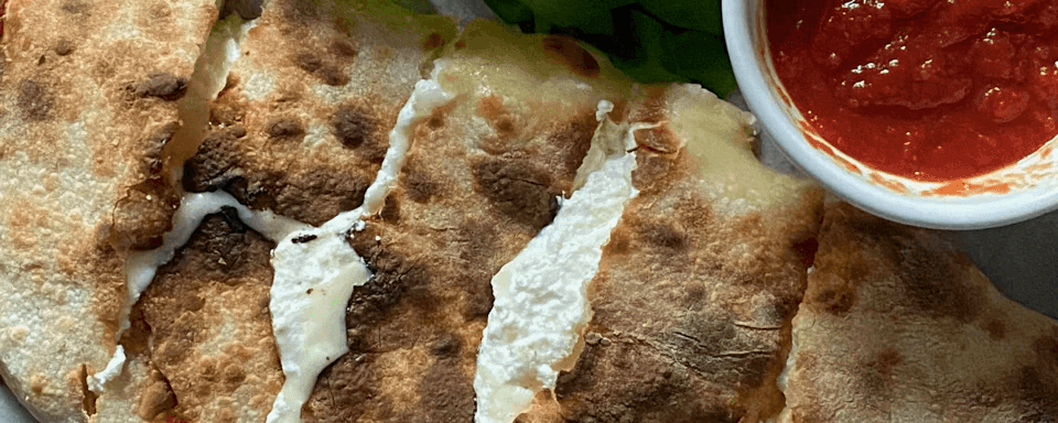 Cheesy Calzone Recipe | Forked